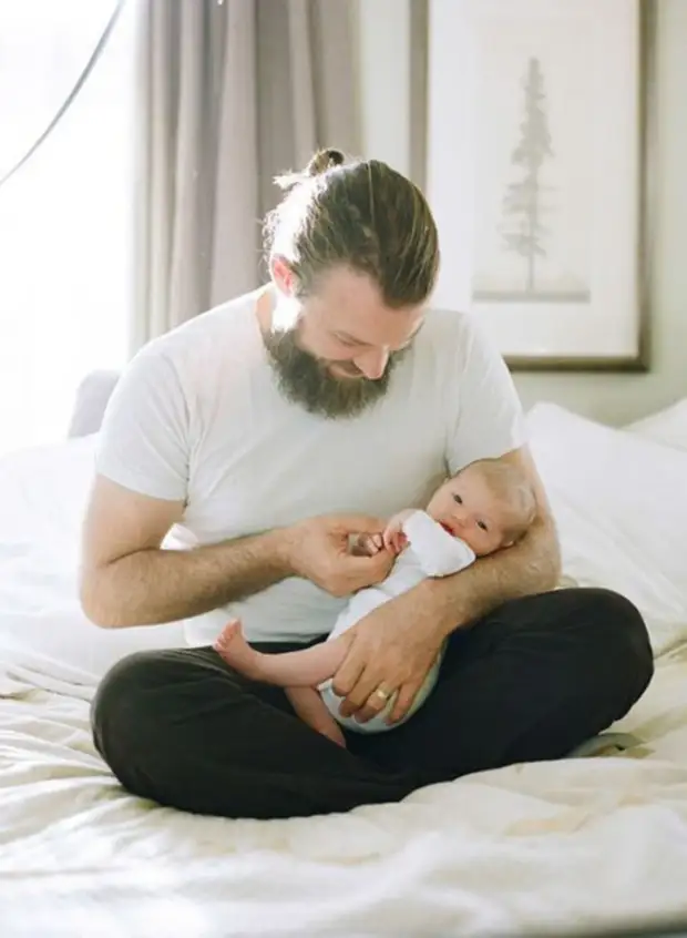 20 søte bilder av glade pappaer og deres babyer