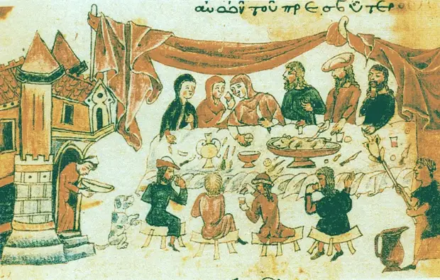 Festeno ĉe la domo de Ijob, bizanca miniaturo de la 14-a jarcento. | Foto: upload.wikimedia.org.