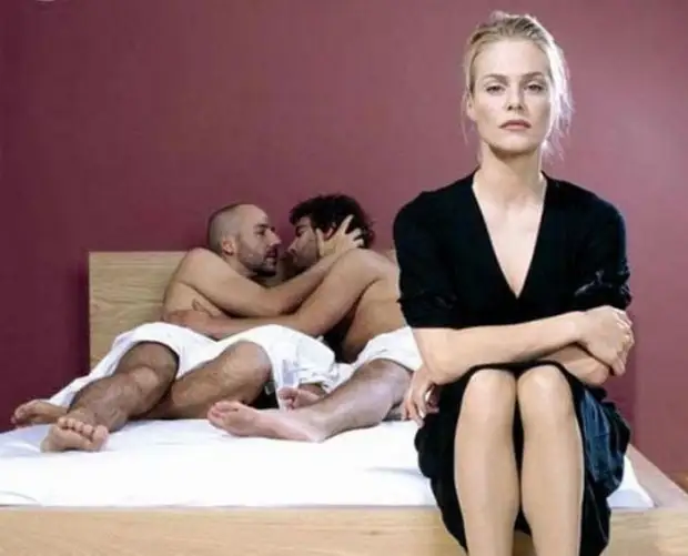 Two men in bed embracing and a disgruntled woman