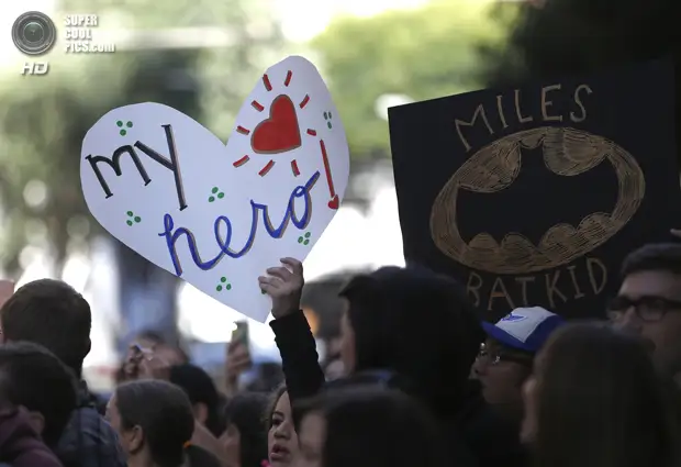USA. San Francisco, California. 15th of November. Batkid's fans came to support the hero. (REUTERS / Stephen Lam)